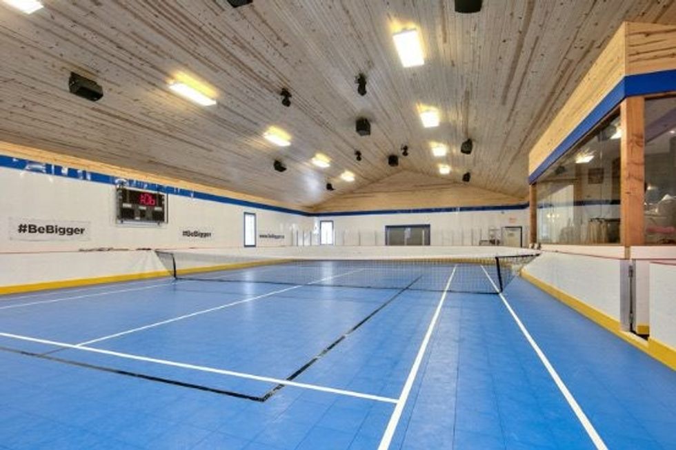 This Stunning Collingwood Chalet Features a Full Hockey Arena